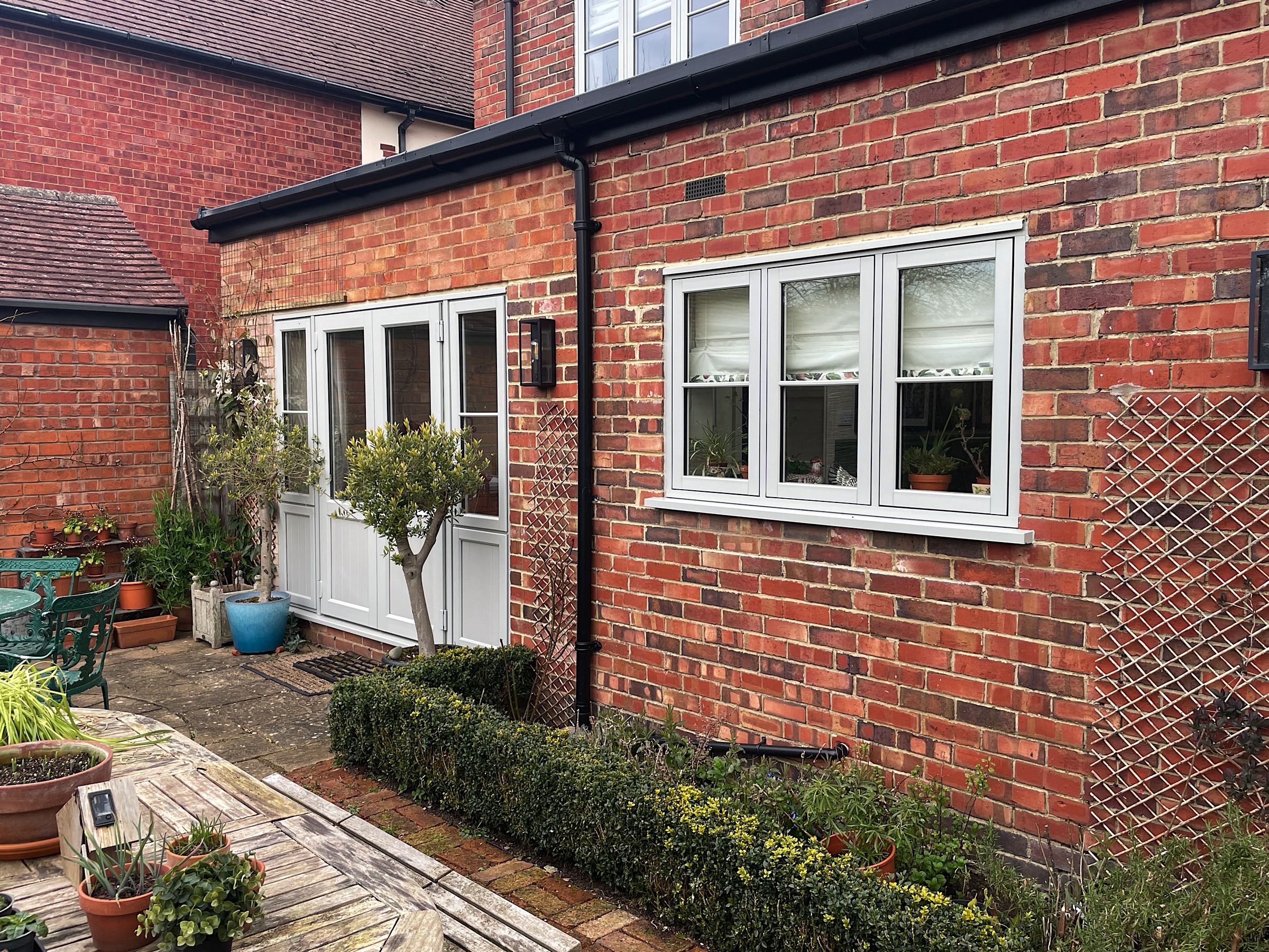 Timber-Look Patio Doors in a Gloucestershire Extension